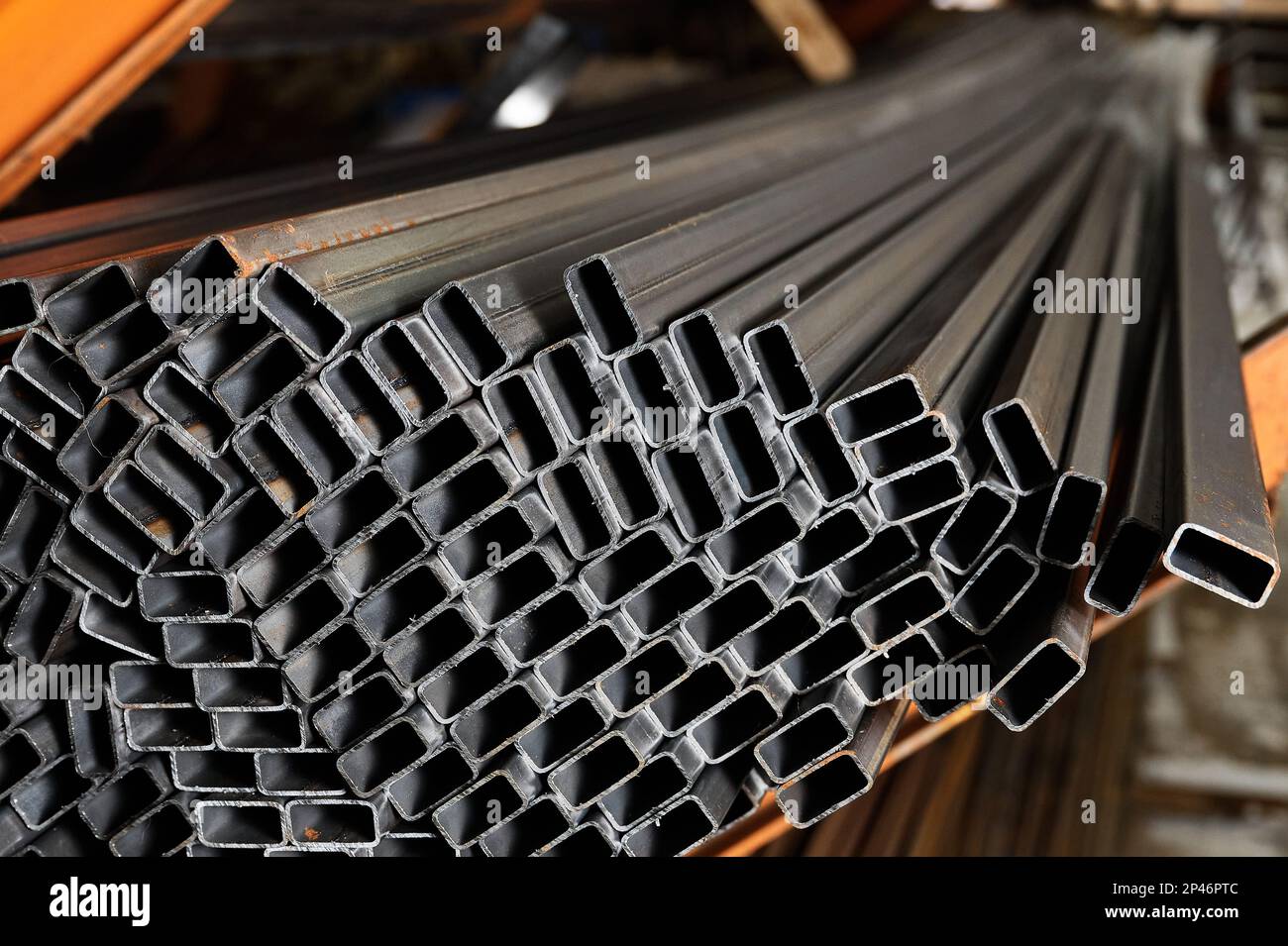Rectangle heat tubing on rack in cold factory warehouse Stock Photo - Alamy