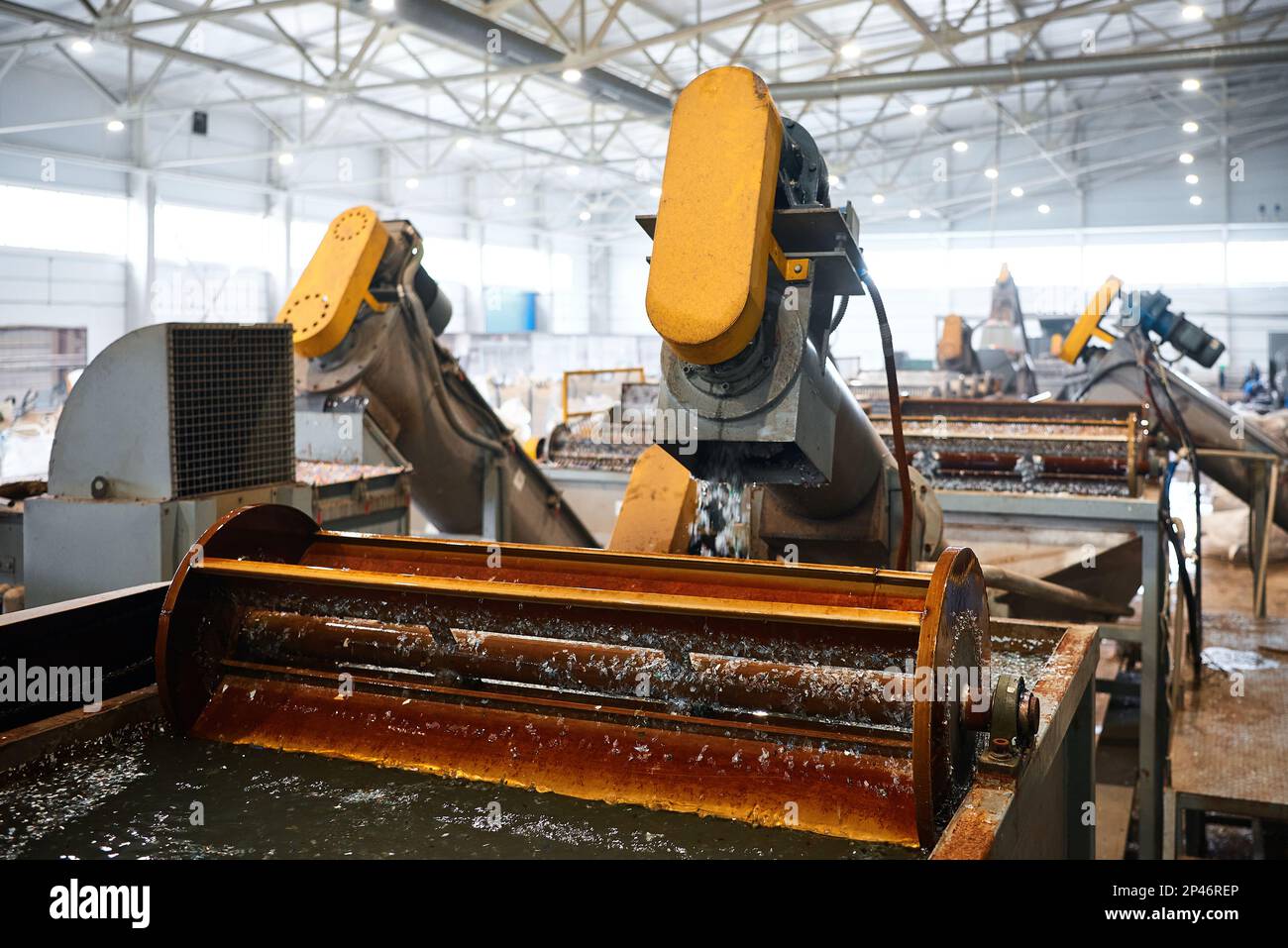Waste plastic chopping machine operates in plant workshop Stock Photo ...