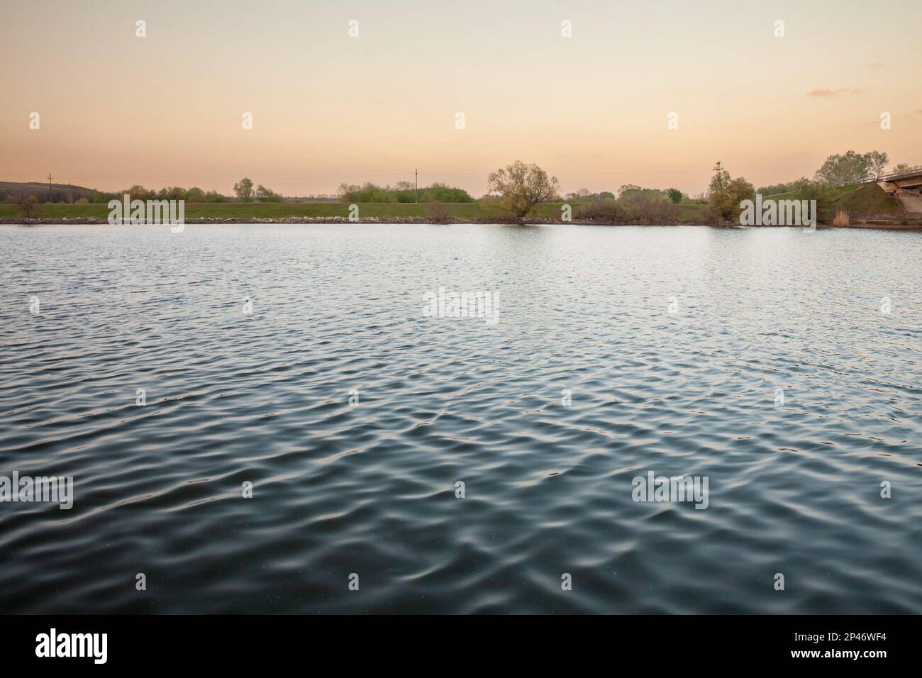 Picture of the DTD canal with serbs fishing in the waters. Danube–Tisa ...