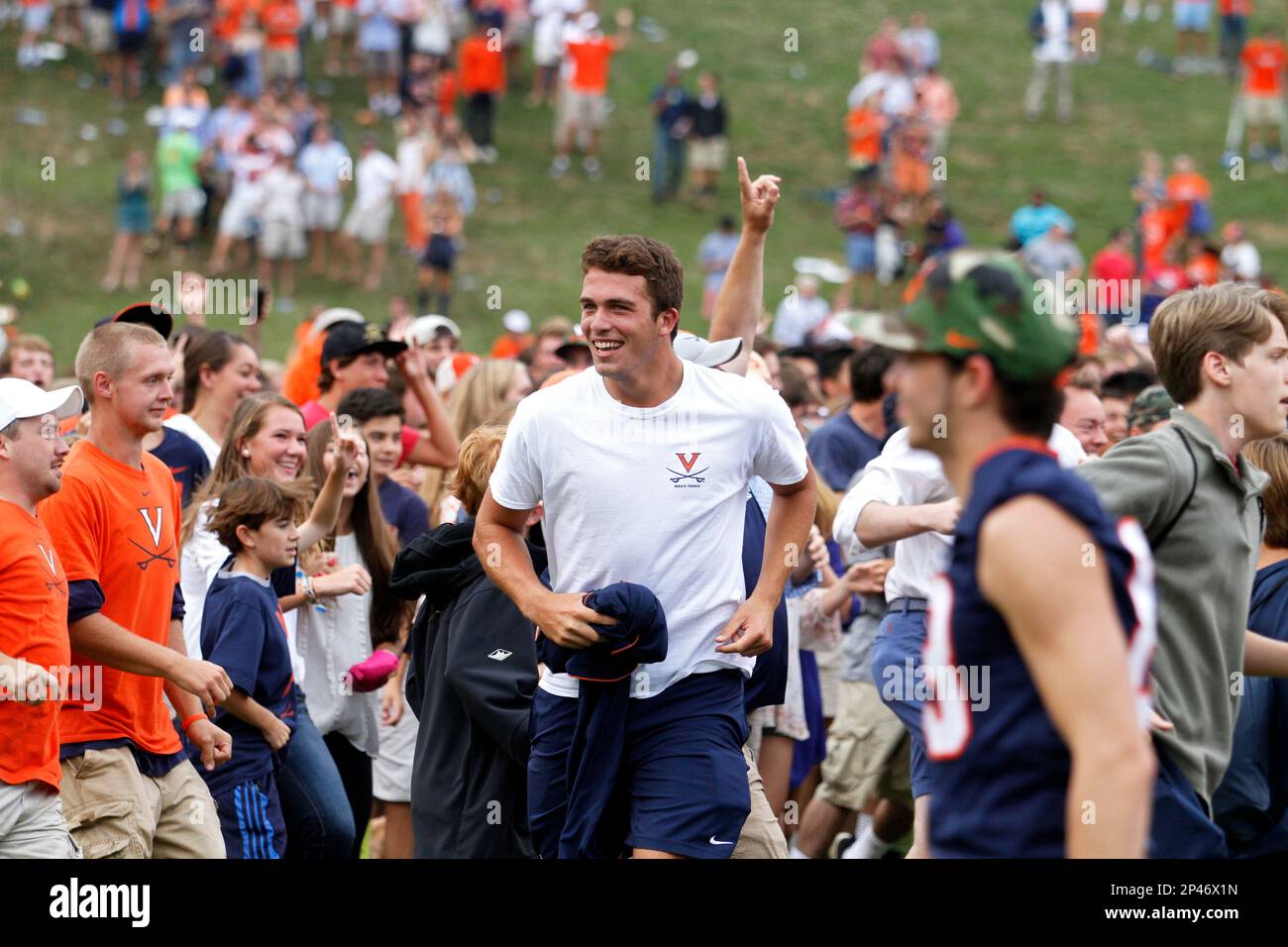 Virginia fans rush the field at Scott Stadium after beating Louisville ...
