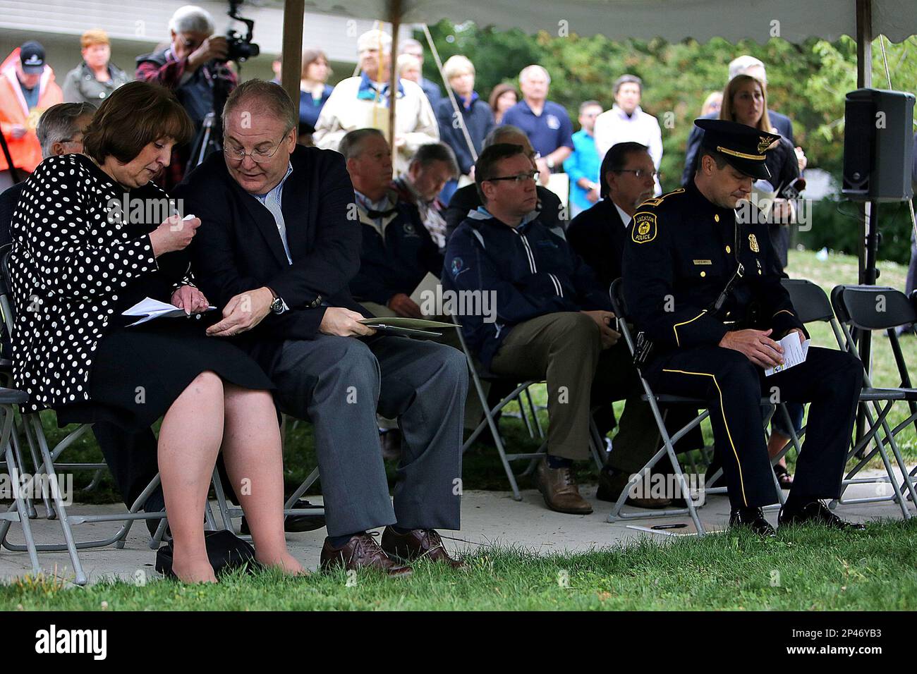 James Bonneau's parents, Mark and Amy share a moment after speaking ...