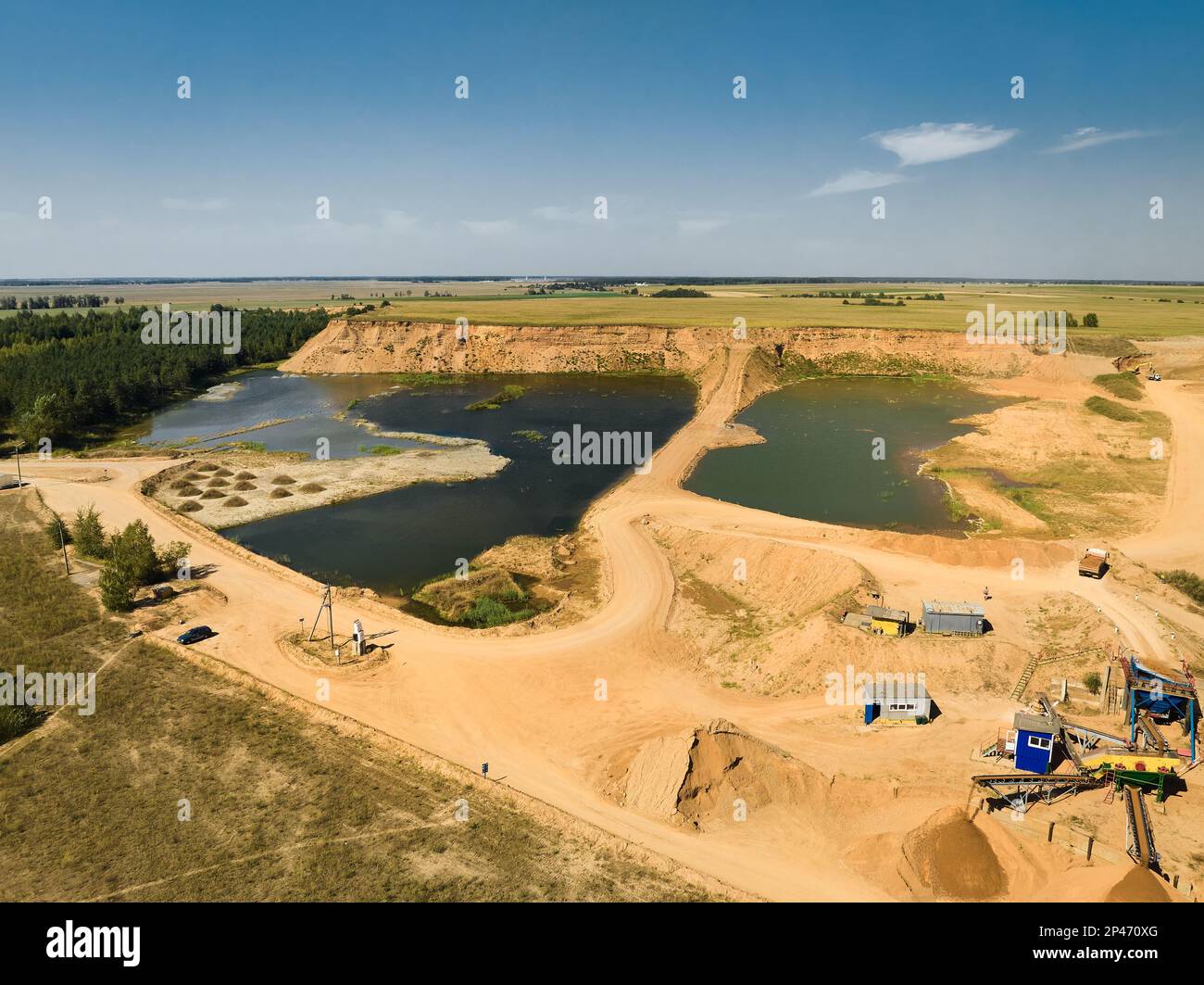 Open mining of constructing sand from illuminated quarry Stock Photo ...