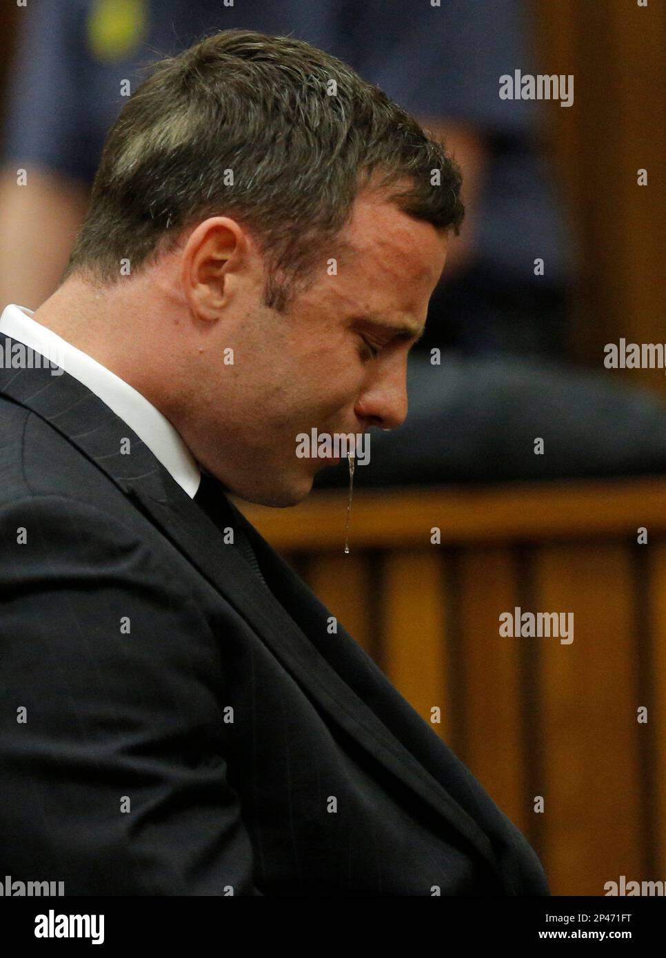 Oscar Pistorius cries in the dock in Pretoria, South Africa, Thursday ...