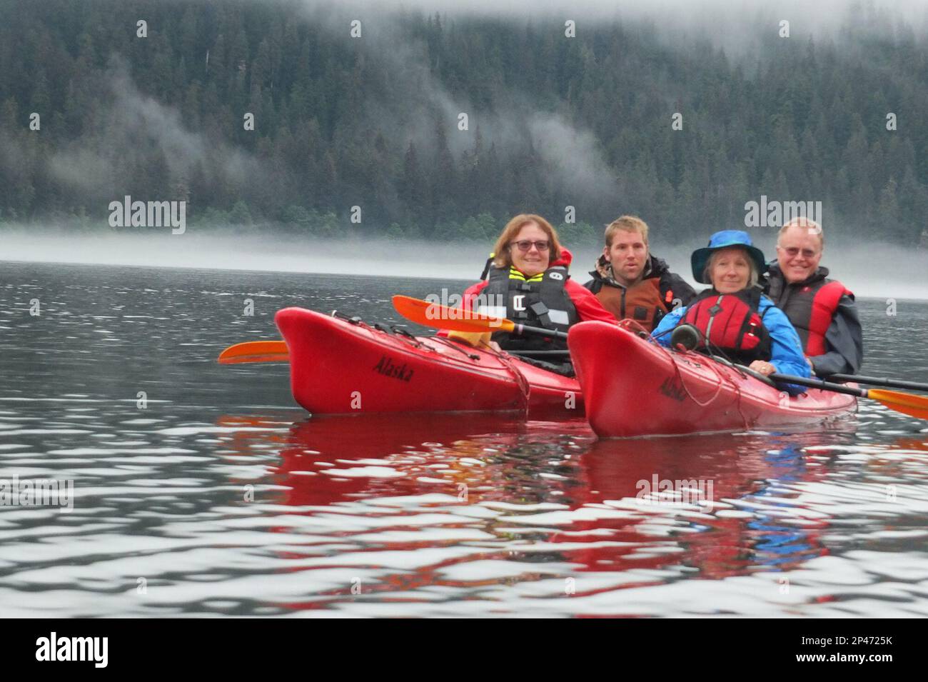 In this July, 2013, photo, from left, Robin Hanley, Bjorn Dihle ...