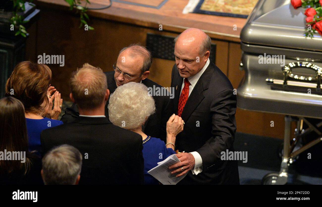 Donald "Bubba" Cathy, left, and Dan Cathy console their sister Trudy ...