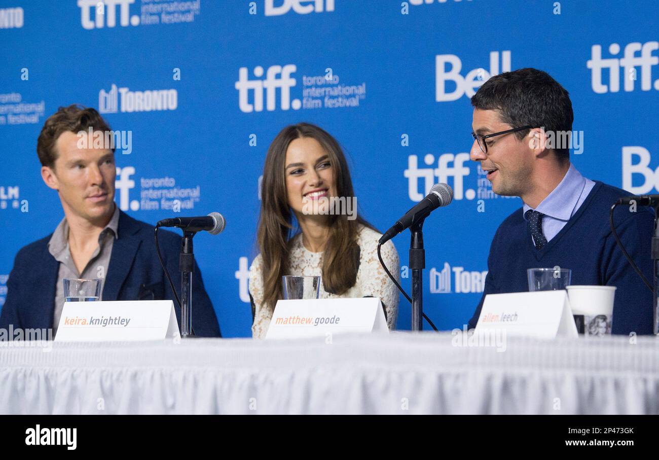 Actors Benedict Cumberbatch, left, and Keira Knightley, center, listen ...
