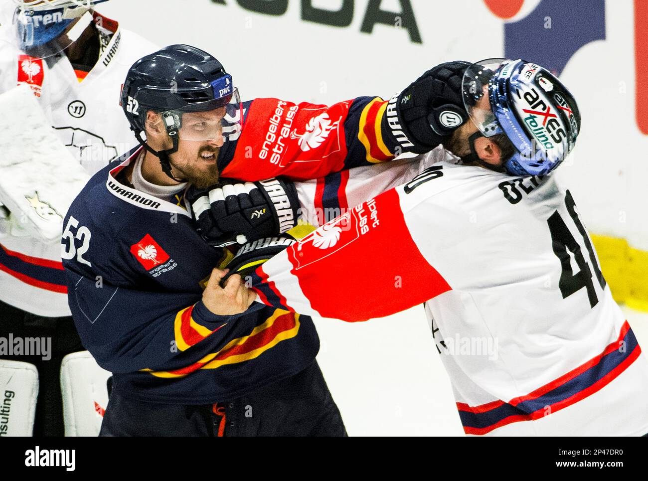 Djurgarden IF's Mikael Ahlen, left, fights with Eisbaren Berlin's Darin ...