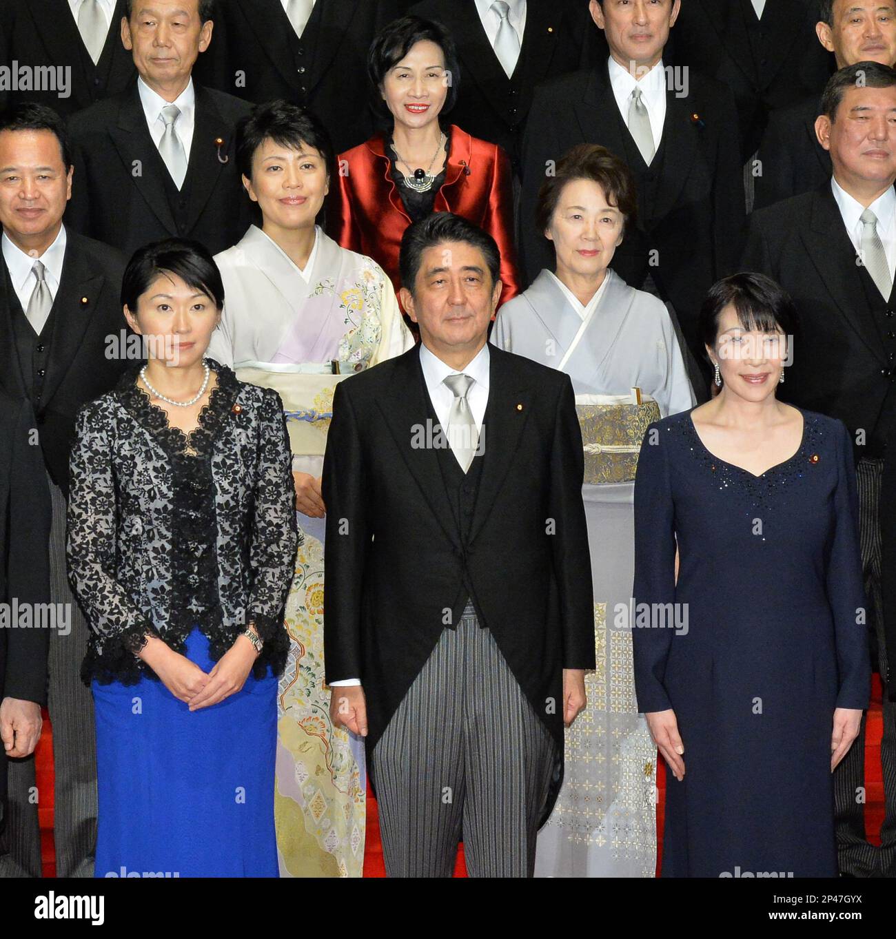 Japanese Prime Minister Shinzo Abe (front, C), poses for an inaugural ...