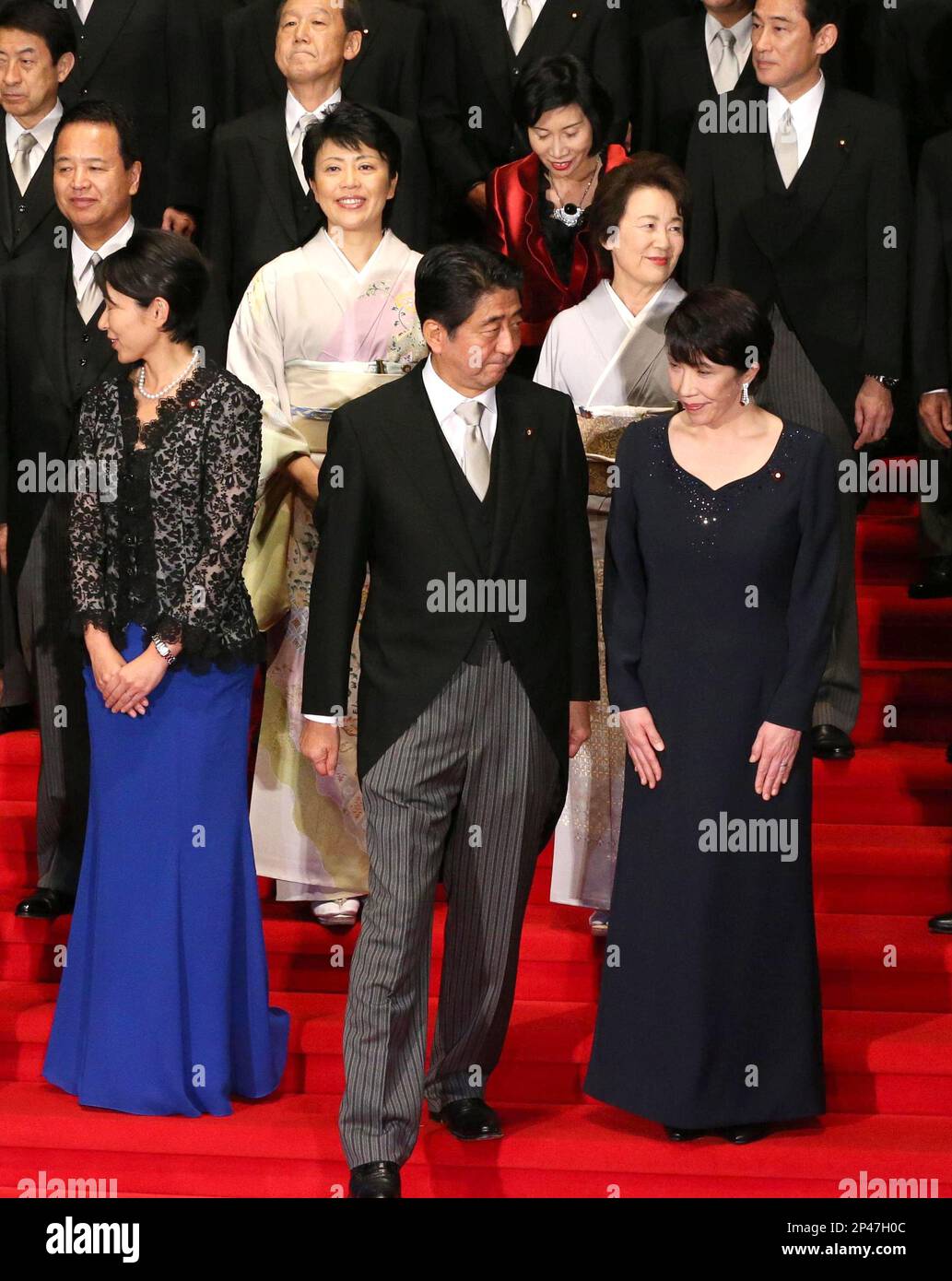 Japanese Prime Minister Shinzo Abe (front, C), poses for an inaugural ...