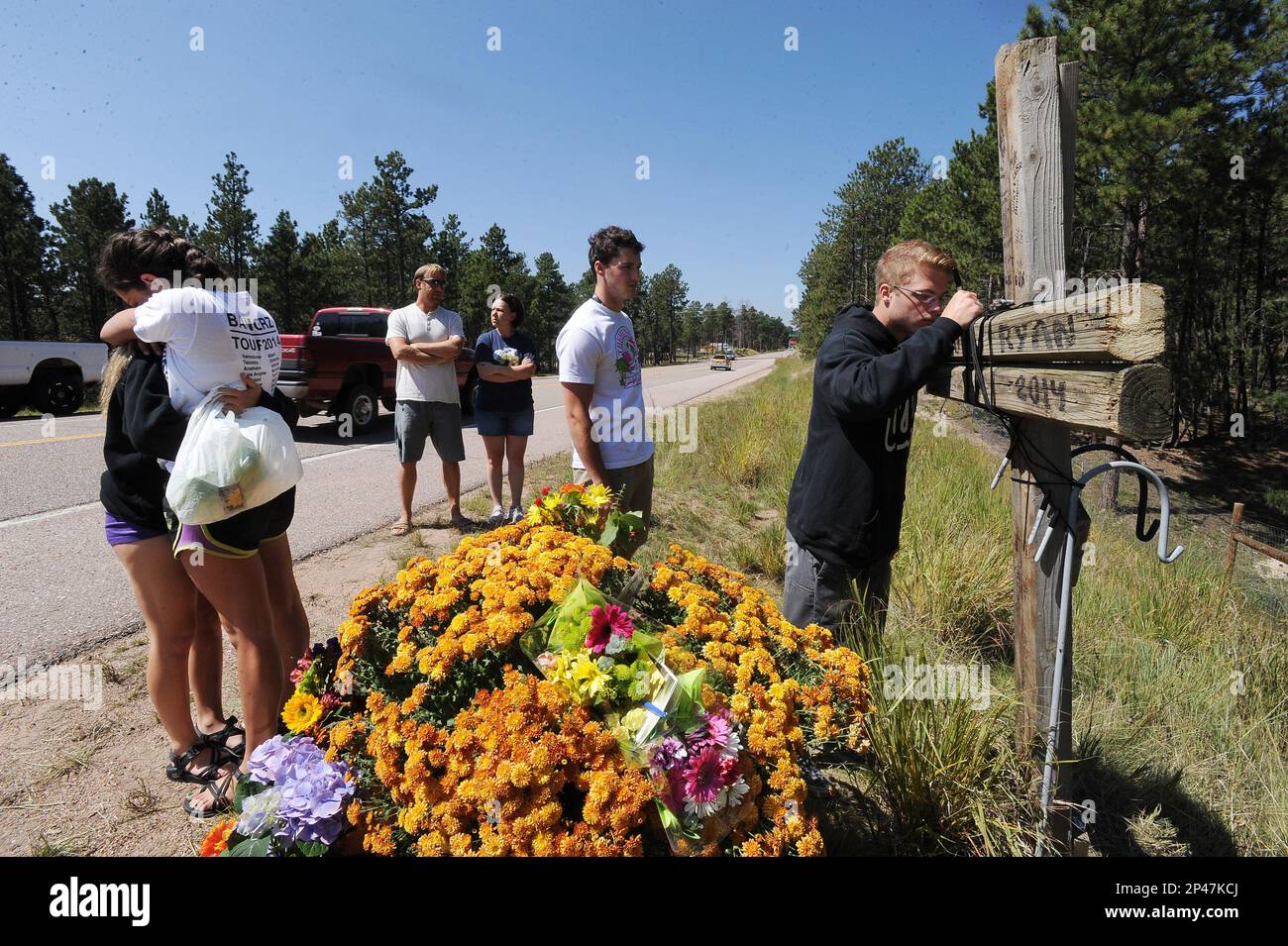 Palmer Ridge High School students visit the scene where two of their ...