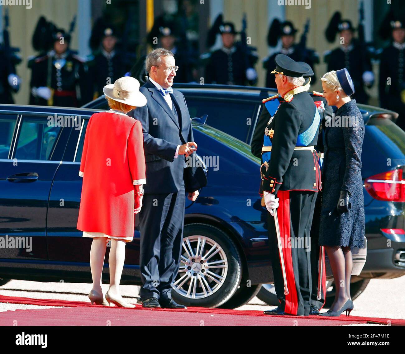 Estonian president Toomas Hendrik Ilves, second left, is welcomed by ...