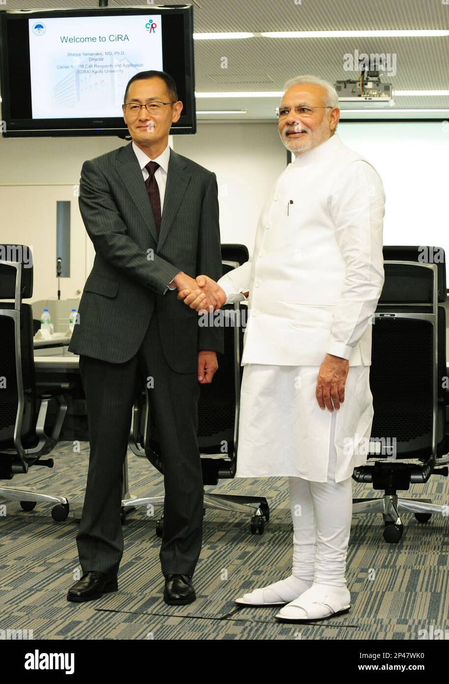 Indian Prime Minister Narendra Modi, left, and iPS cell researcher and ...