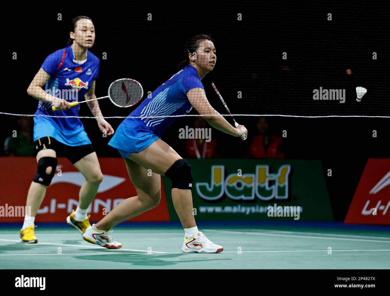 China's Tian Qing and Zhao Yunlei return a shot to South Korea’s Lee So ...