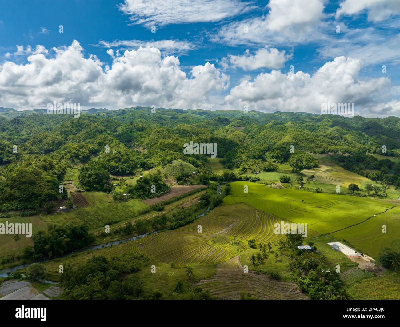 Farmland on the slopes of hills in the mountainous region view from ...