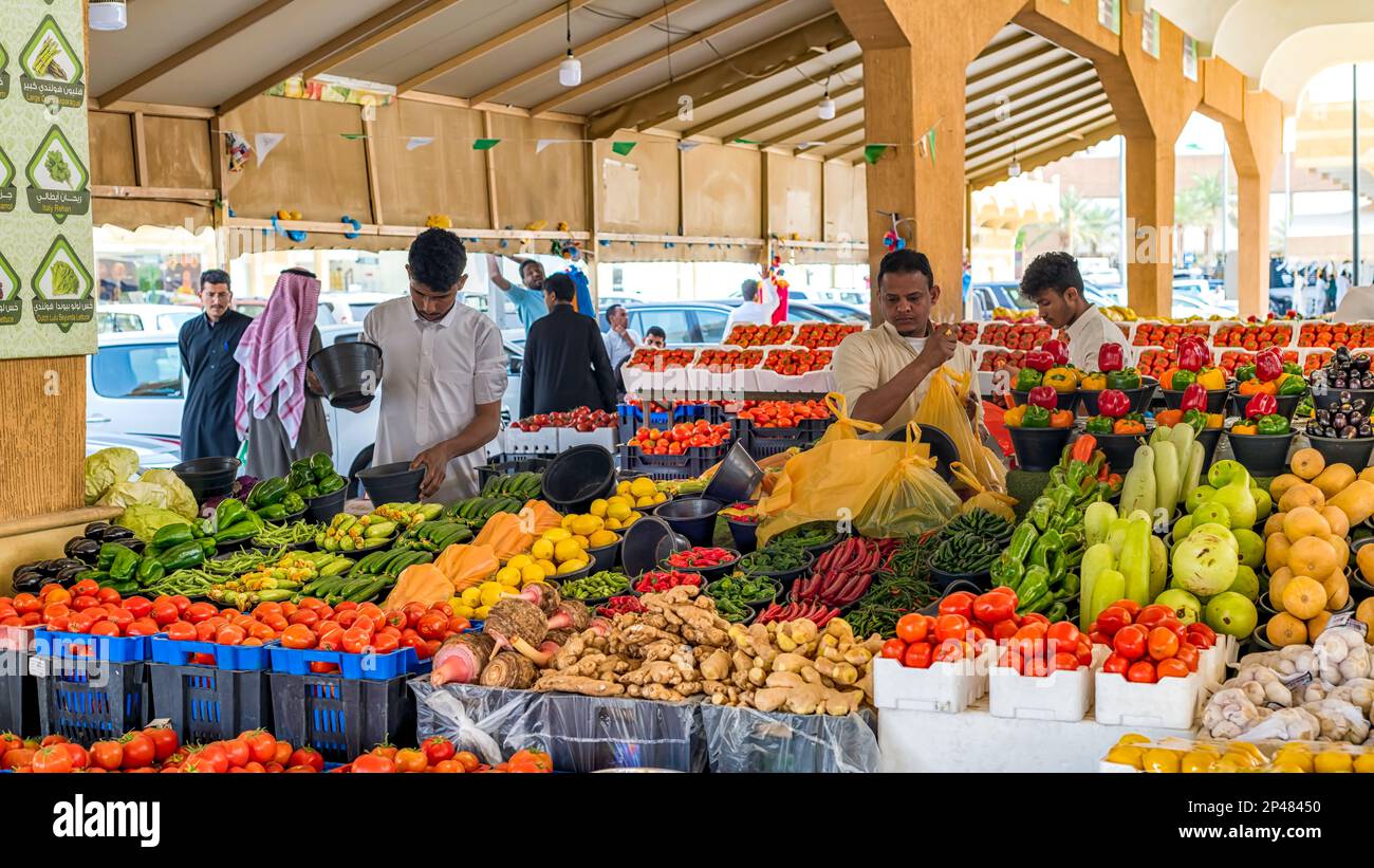 Buying vegetables at the Souk market Stock Photo - Alamy
