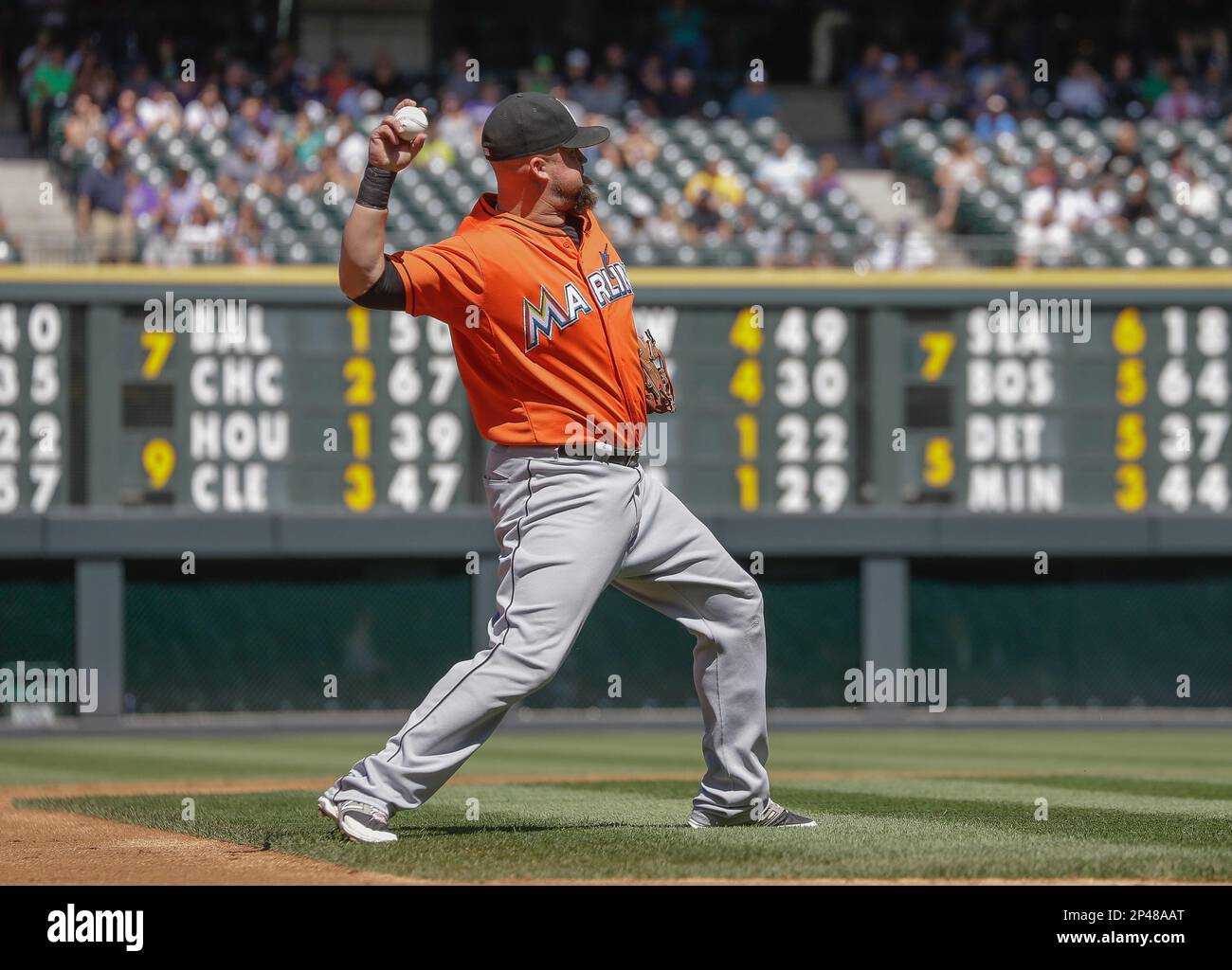 Miami Marlins third baseman Casey McGehee (9) makes the throw to first ...