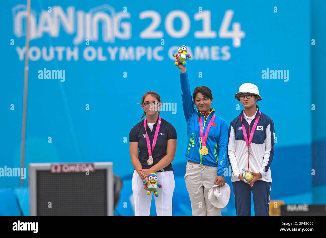 (From left) Silver medalist Melanie Gaubil of France, gold medalist Li ...