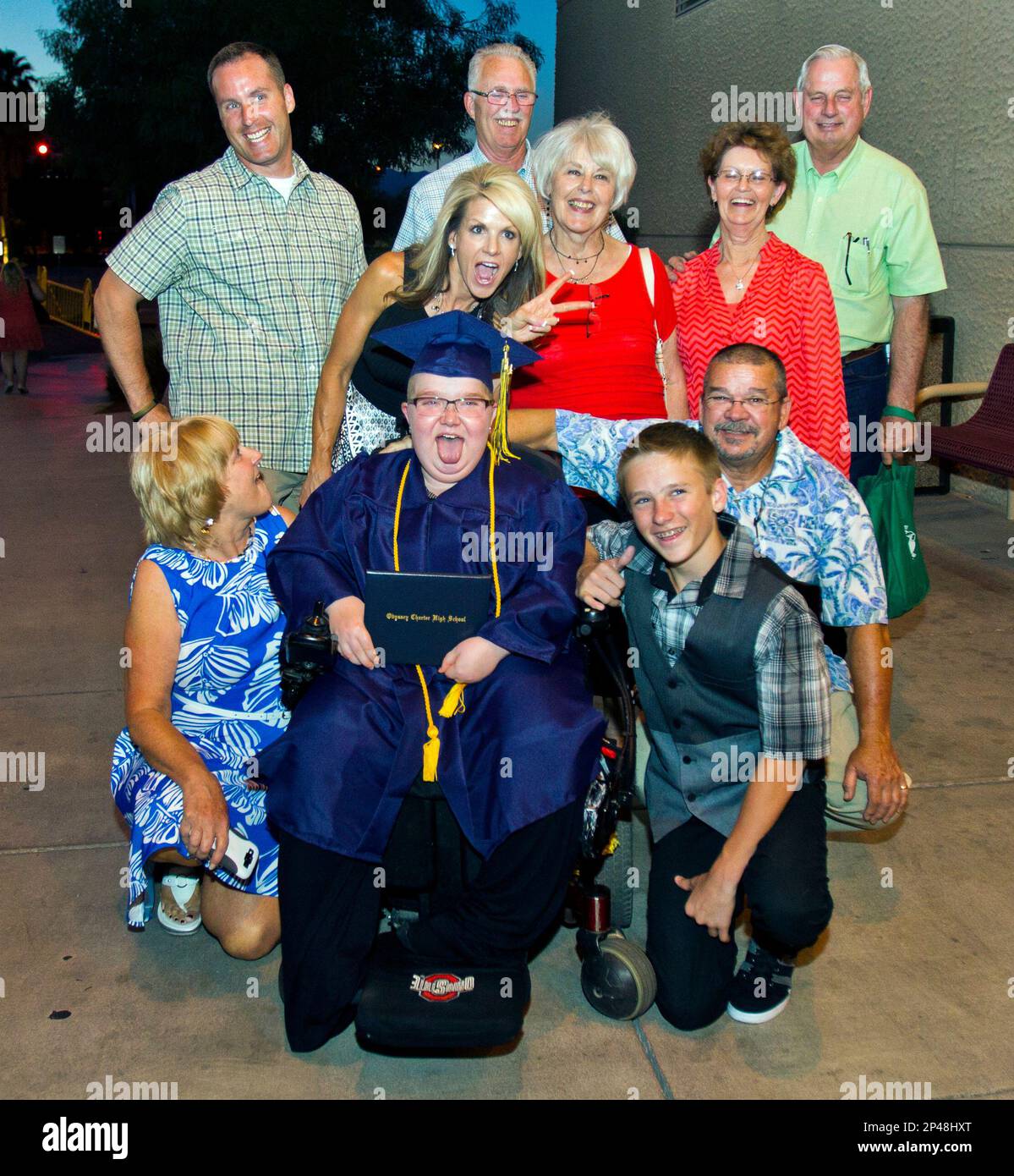In this June 3, 2014 photo, Colton Shrum and his family members pose ...