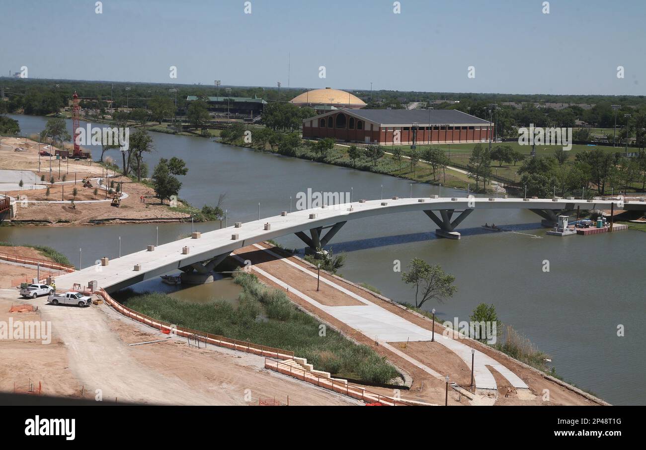 FILE - In this April 30, 2014, file photo, a pedestrian bridge connects ...
