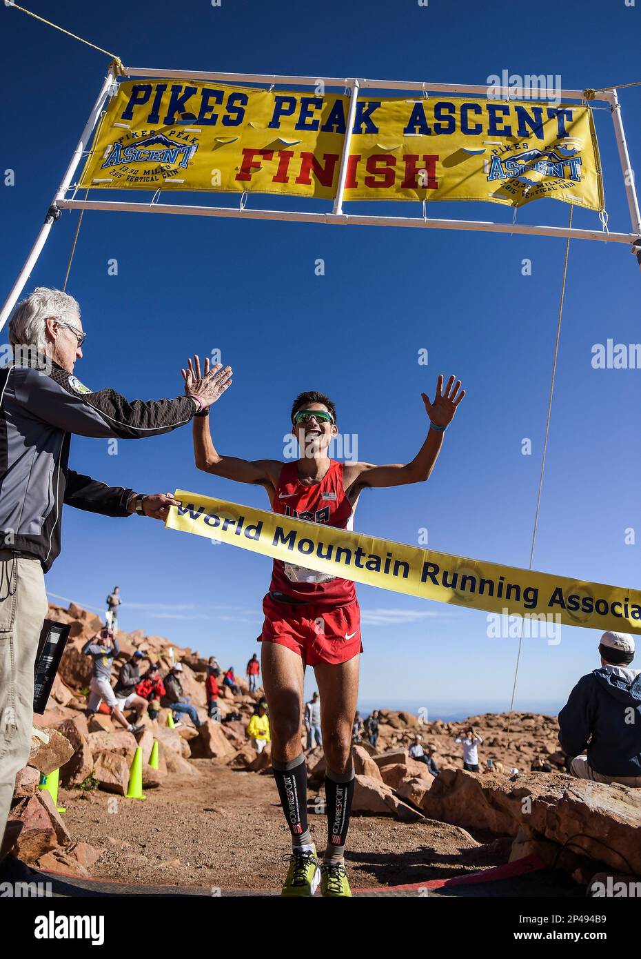 Sage Canaday celebrates as he crosses the finish line as men's winner ...