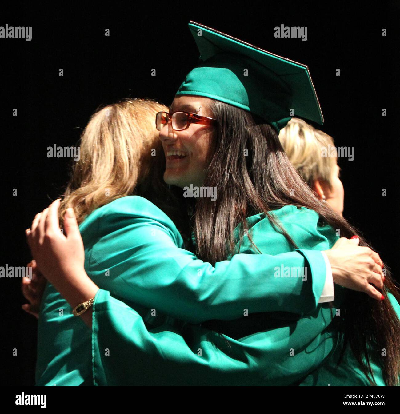 Monica Bayarena, left, principal of Coles High School, gives Destiny ...
