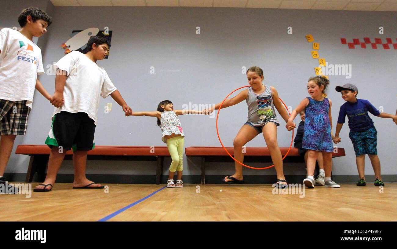 Children play a game before designing their dream playgrounds ...