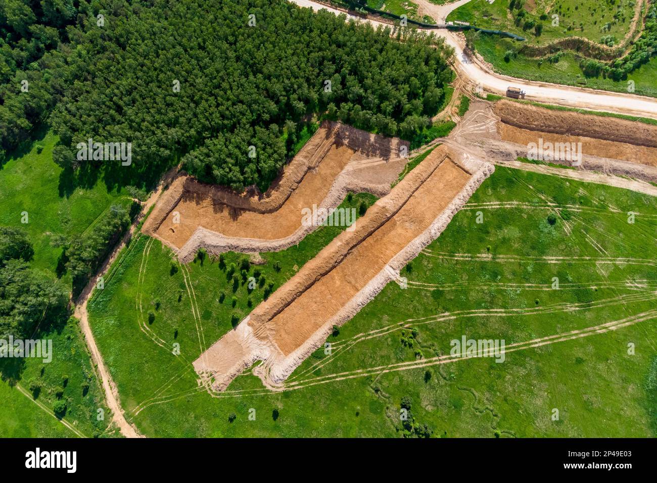 Removal of the top layer of earth overburden for the development of a ...