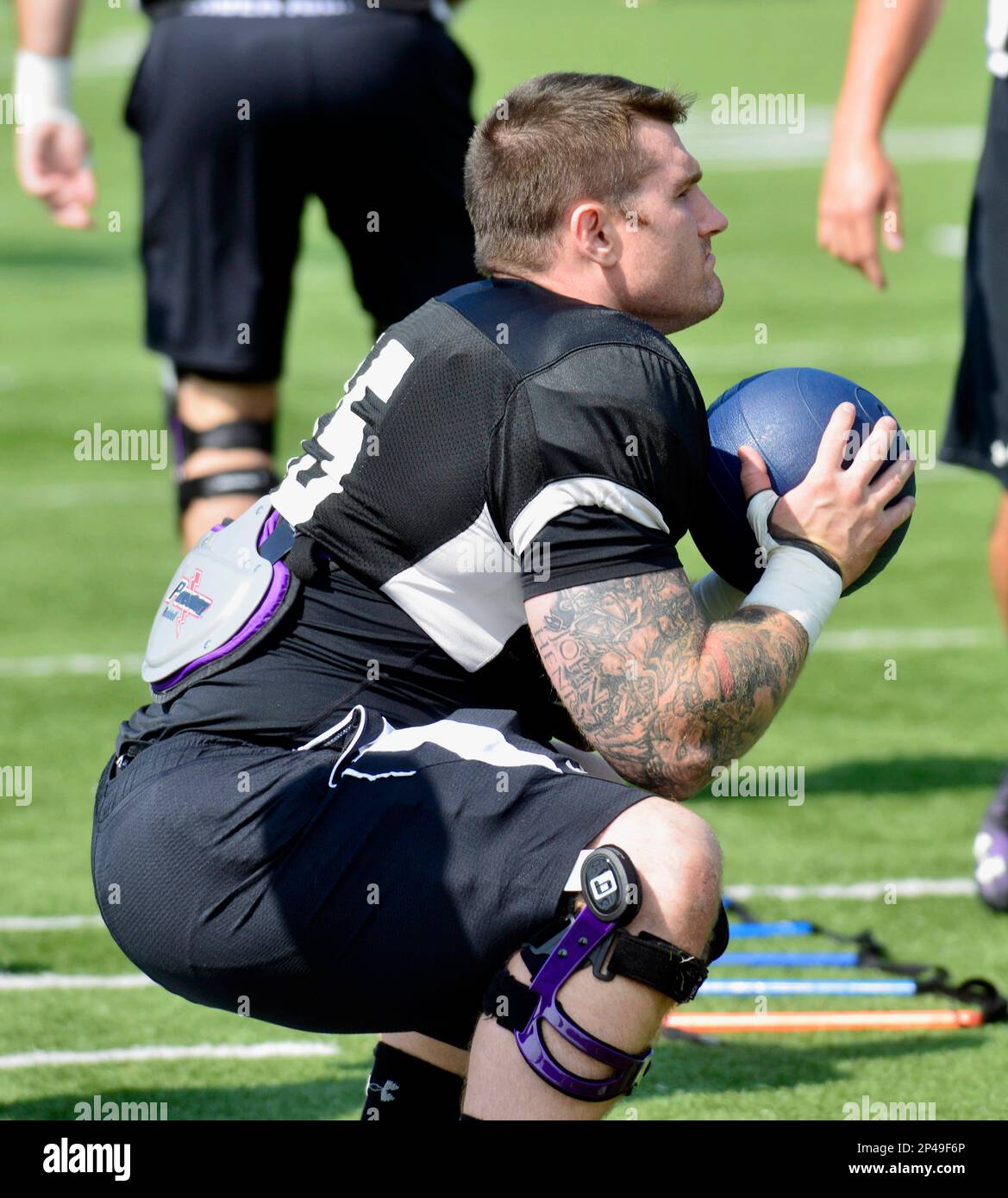 In this Aug. 7, 2014 photo, Tom Hruby goes through drills at ...