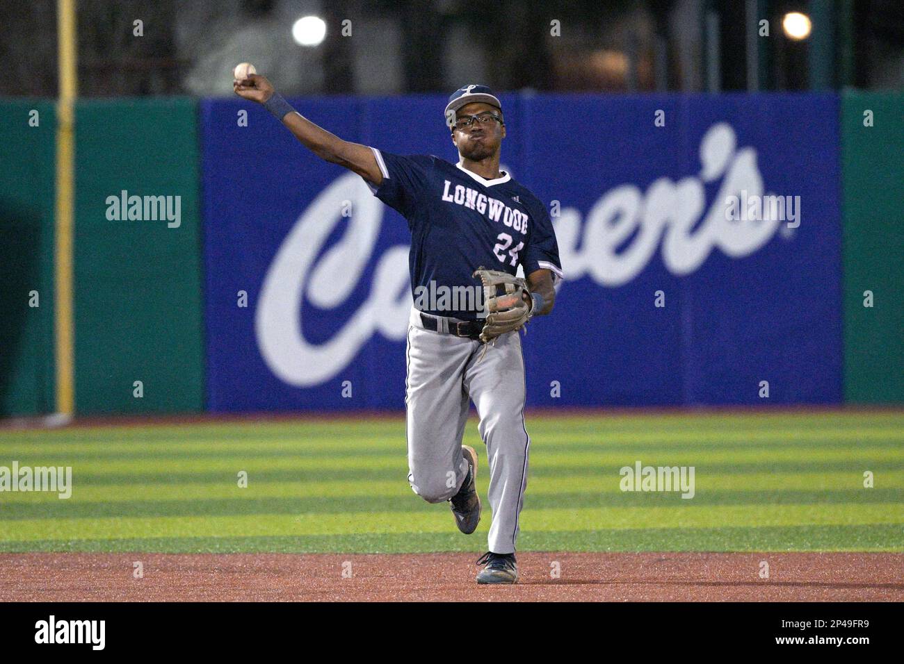 Longwood infielder Gregory Ryan (24) throws during an NCAA college ...