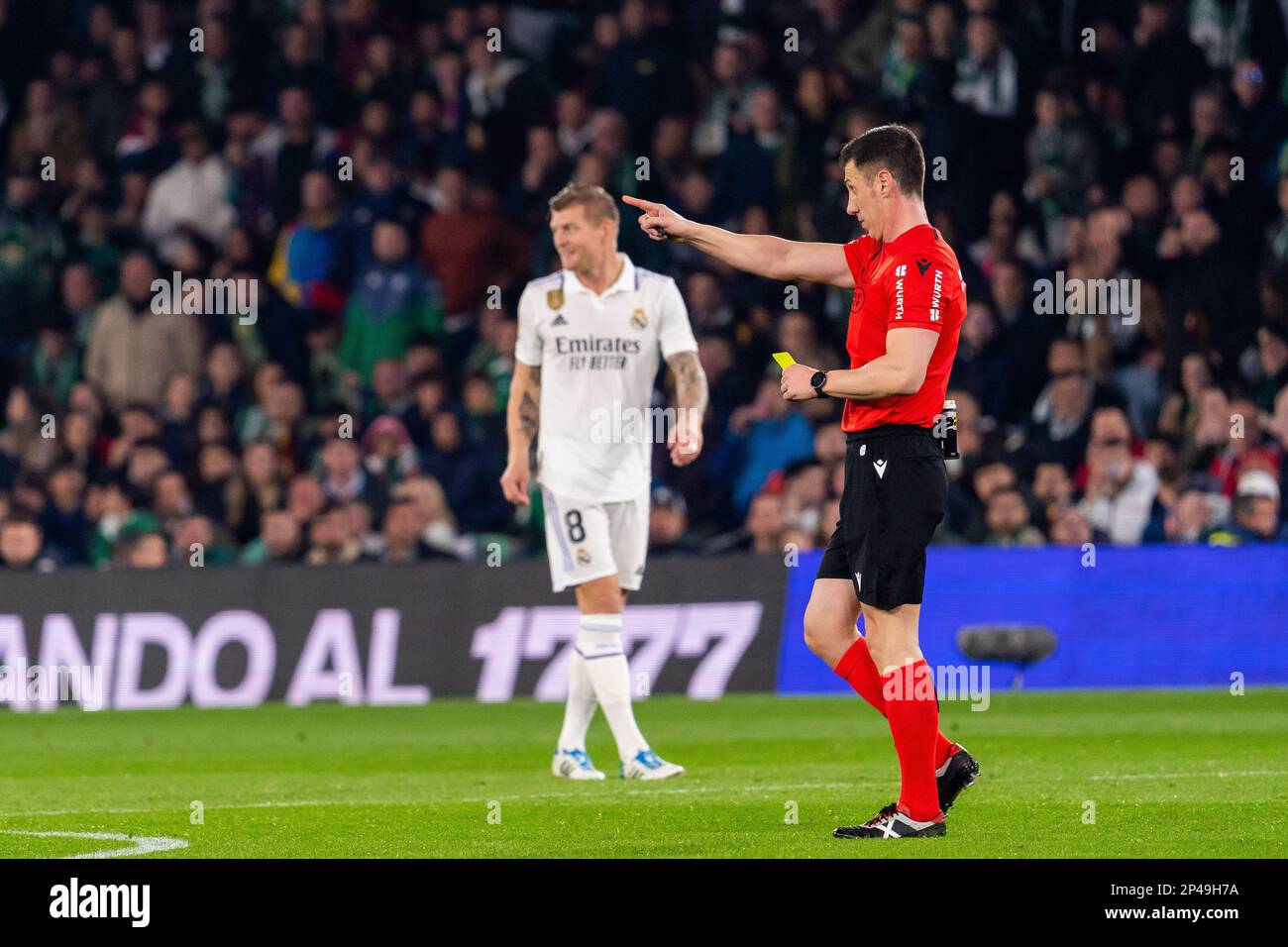 Seville, Spain. 08th Jan, 2022. Referee Soto Grado (R) and Toni Kroos ...