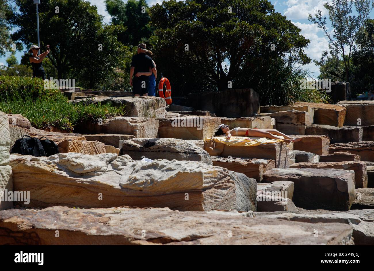 People swim at Marrinawi Cove at Barangaroo in Sydney, Monday, March 6 ...