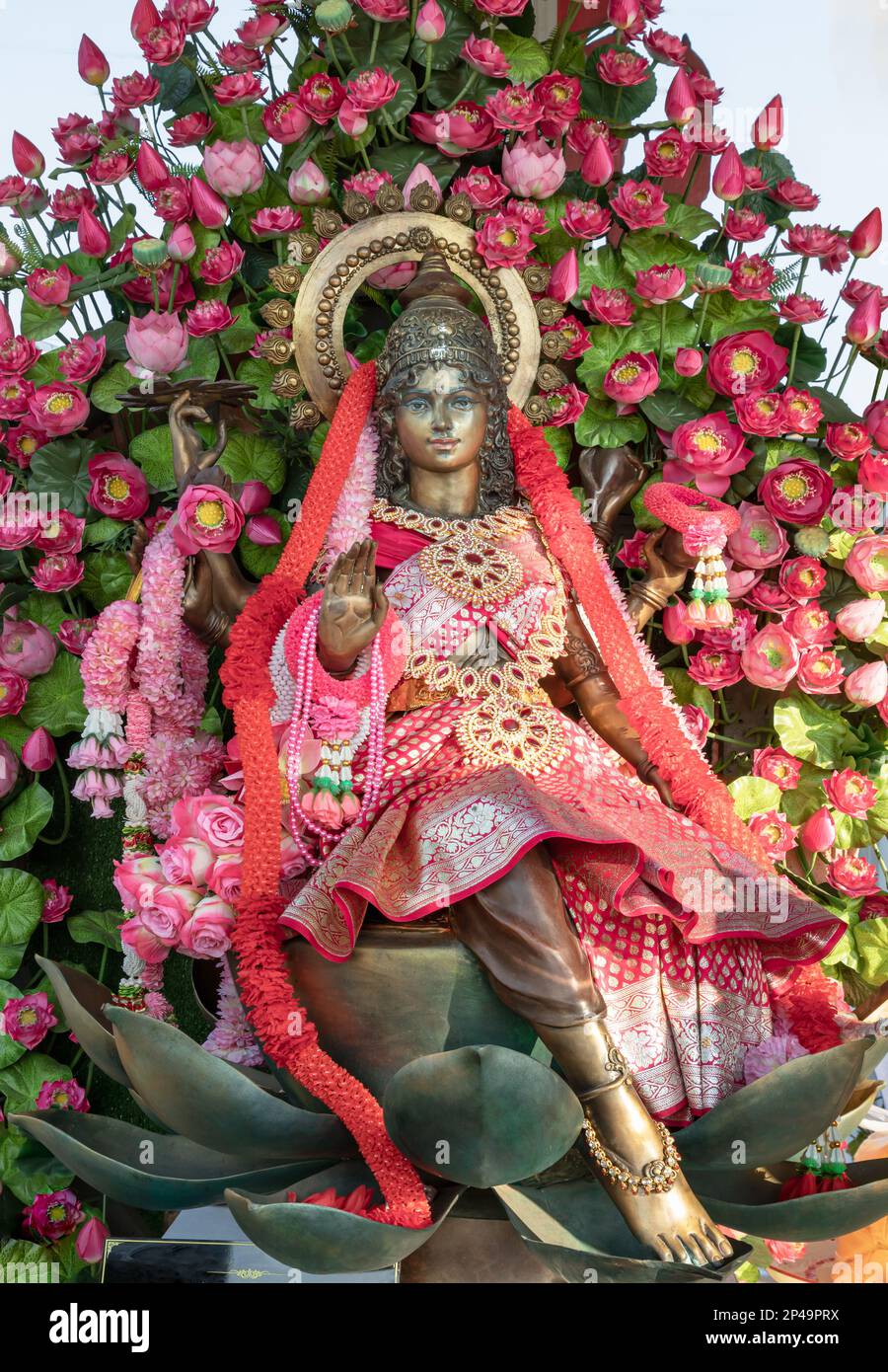 Statue of Brass Hindu Goddess Lakshmi (Maha Laxshmi) is decorated with ...