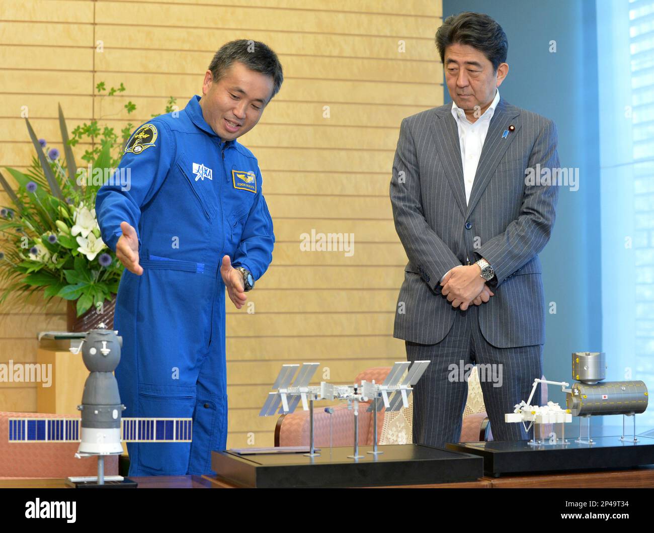 Japanese astronaut Koichi Wakata, left, the first Japanese commander of ...