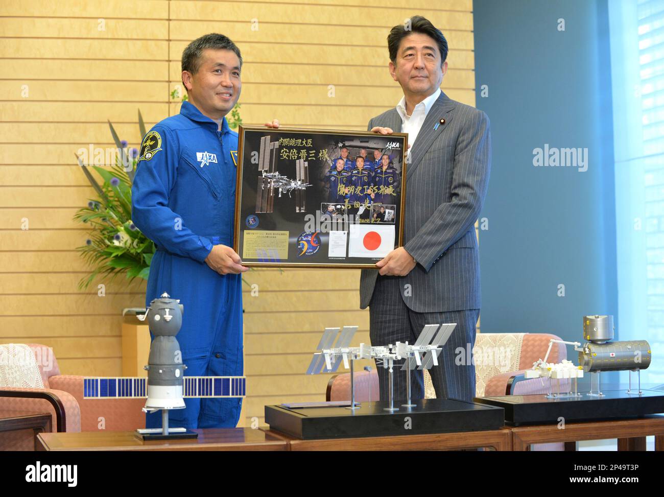 Japanese astronaut Koichi Wakata, left, the first Japanese commander of ...