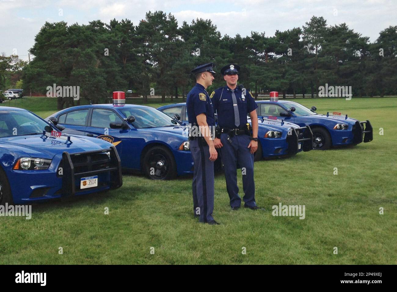 Michigan State Police Troopers Brett Beardslee and Dan Nease stand by ...