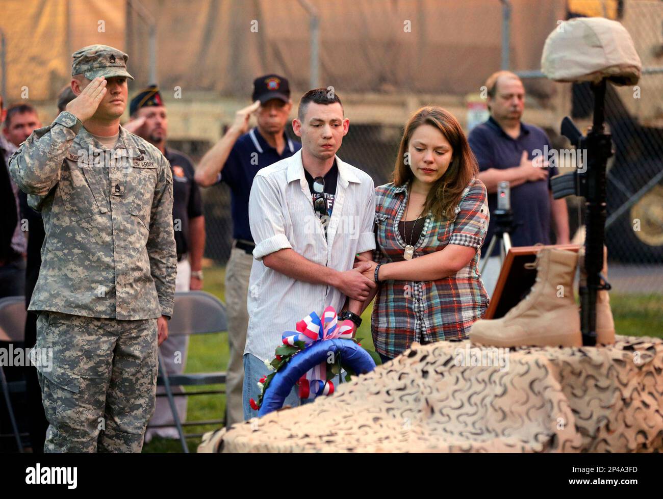 Daniel Cherry and his sister, Kaitlyn Cherry, hold hands Friday Aug. 1 ...
