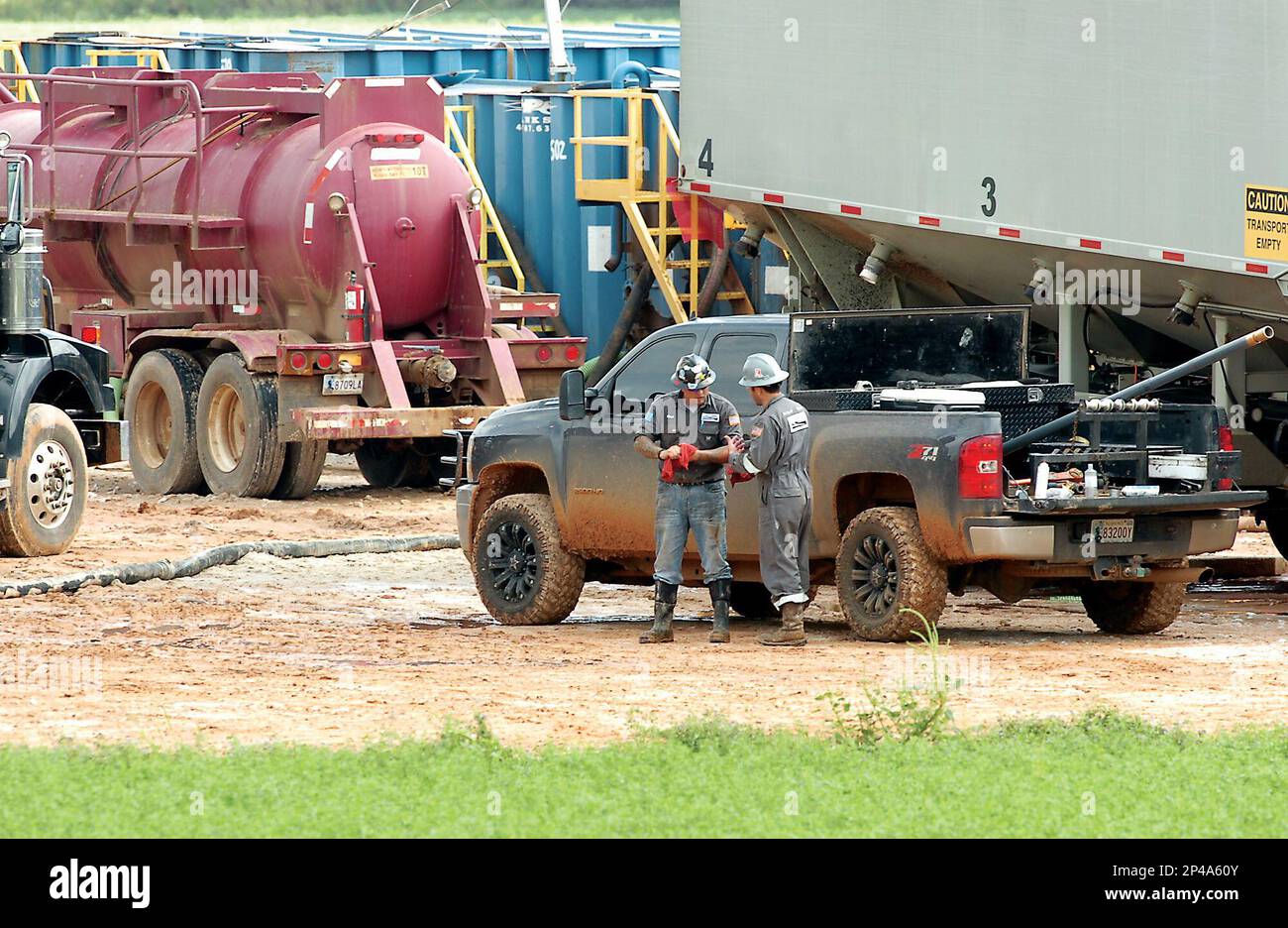 Cleanup continues at the site of a fracking-related spill Thursday ...