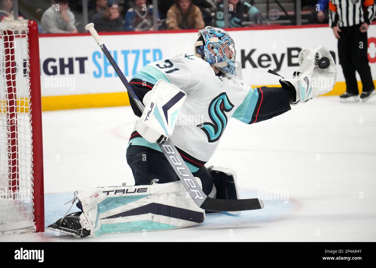Seattle Kraken goaltender Philipp Grubauer makes a glove save in the ...