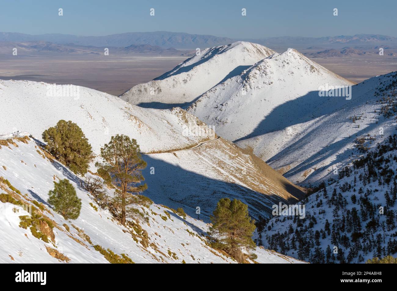 Snow-filled mountains in the Sierra Nevada range in Inyo County ...
