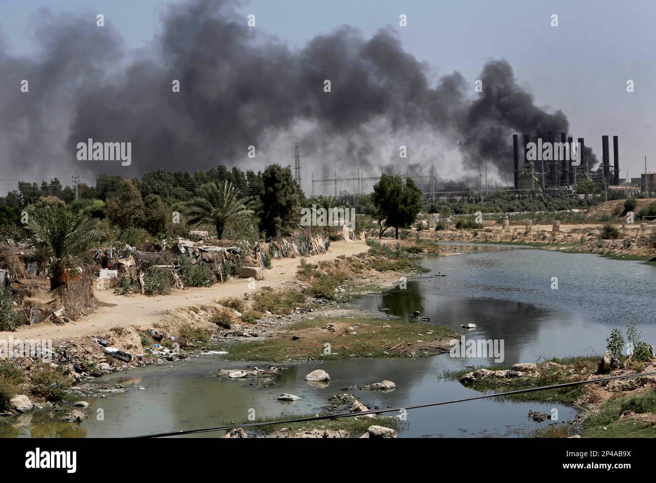 Smoke rises from the Gaza power plant after it was hit by Israeli ...