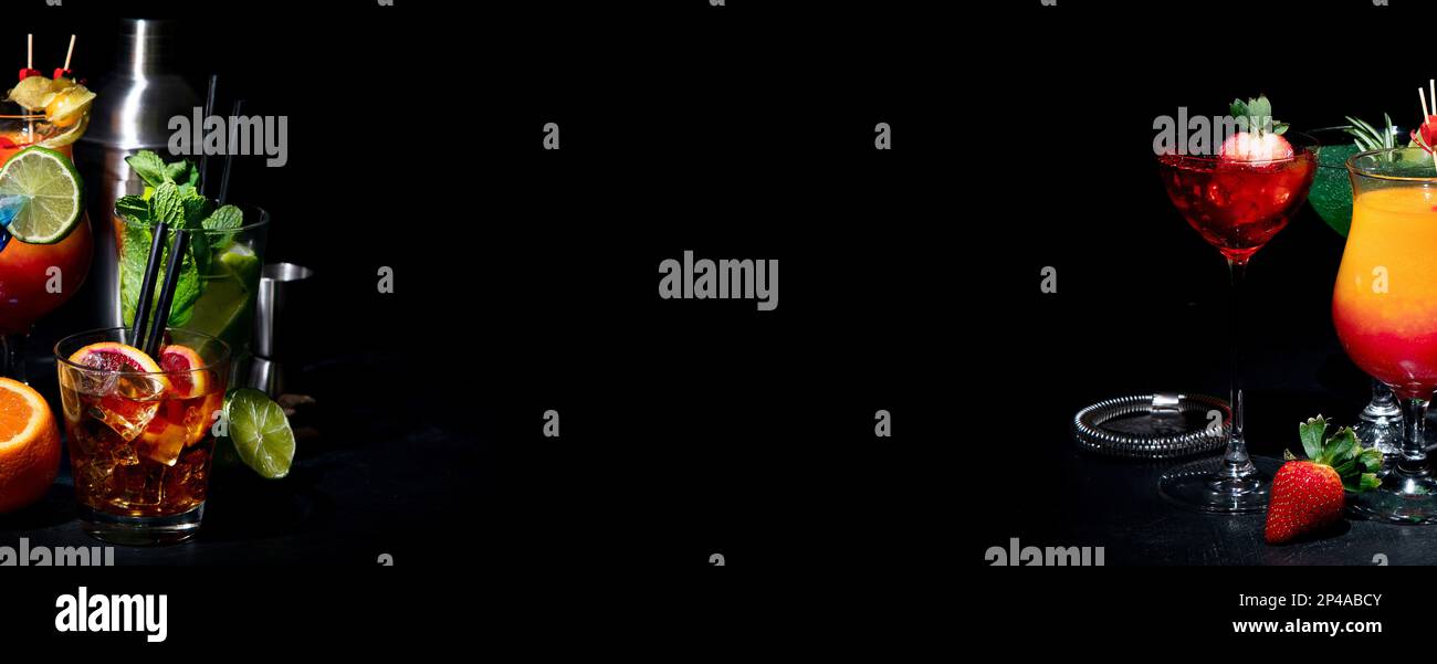 Set of various colorful cocktails on black background. Classic long ...