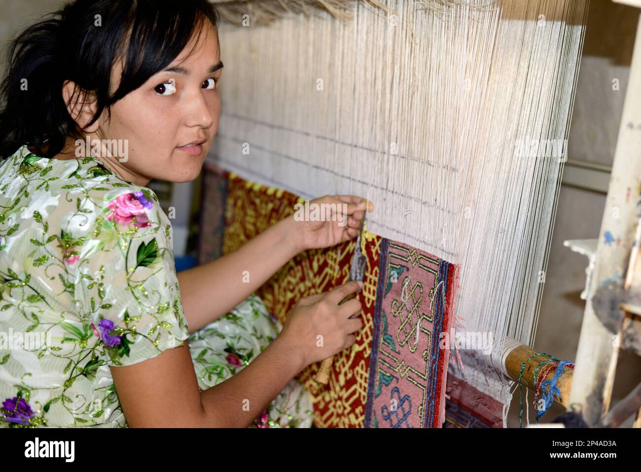 Uzbek woman weaving hi-res stock photography and images - Alamy