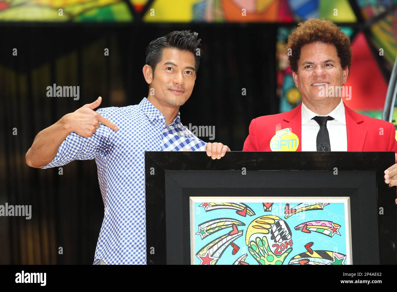 Singer and actor Aaron Kwok attends Romero Britto art activity in Hong ...