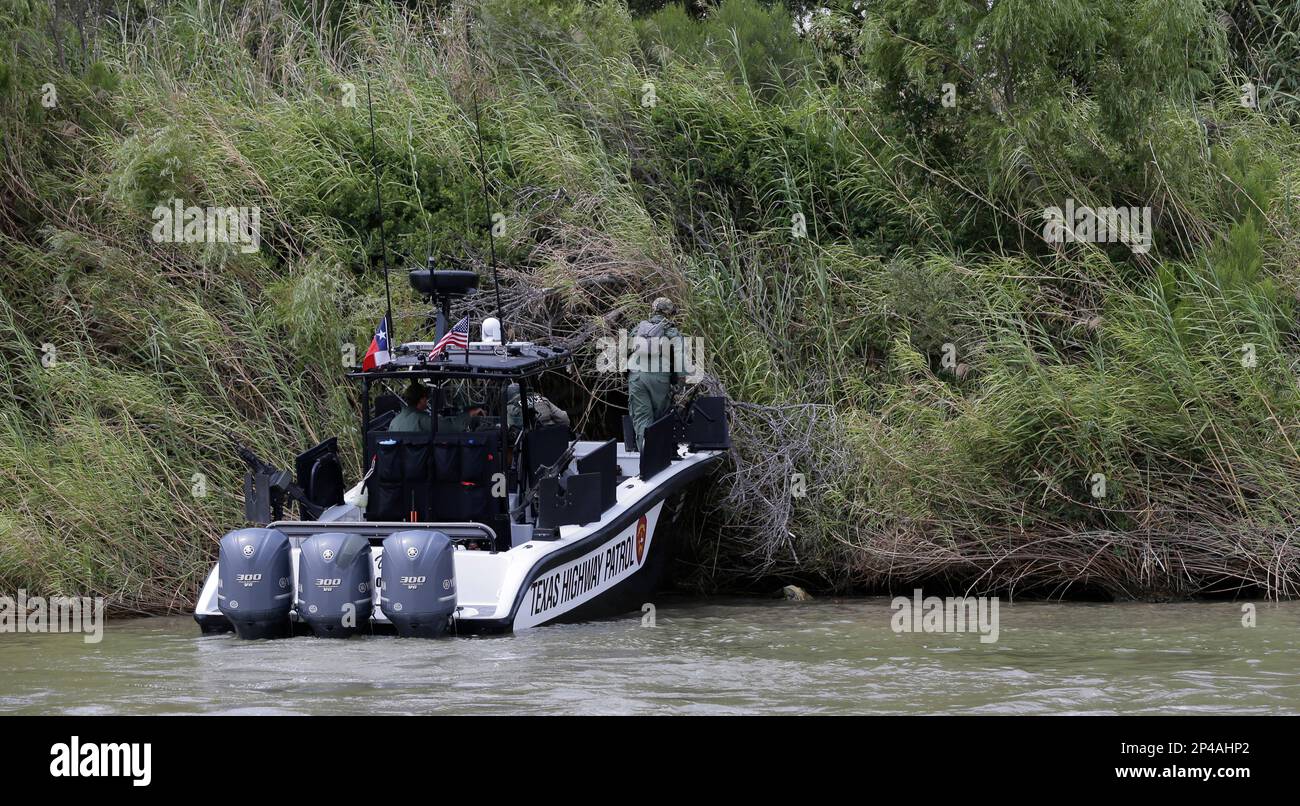 Texas Department of Safety Troopers patrol on the Rio Grande along the ...
