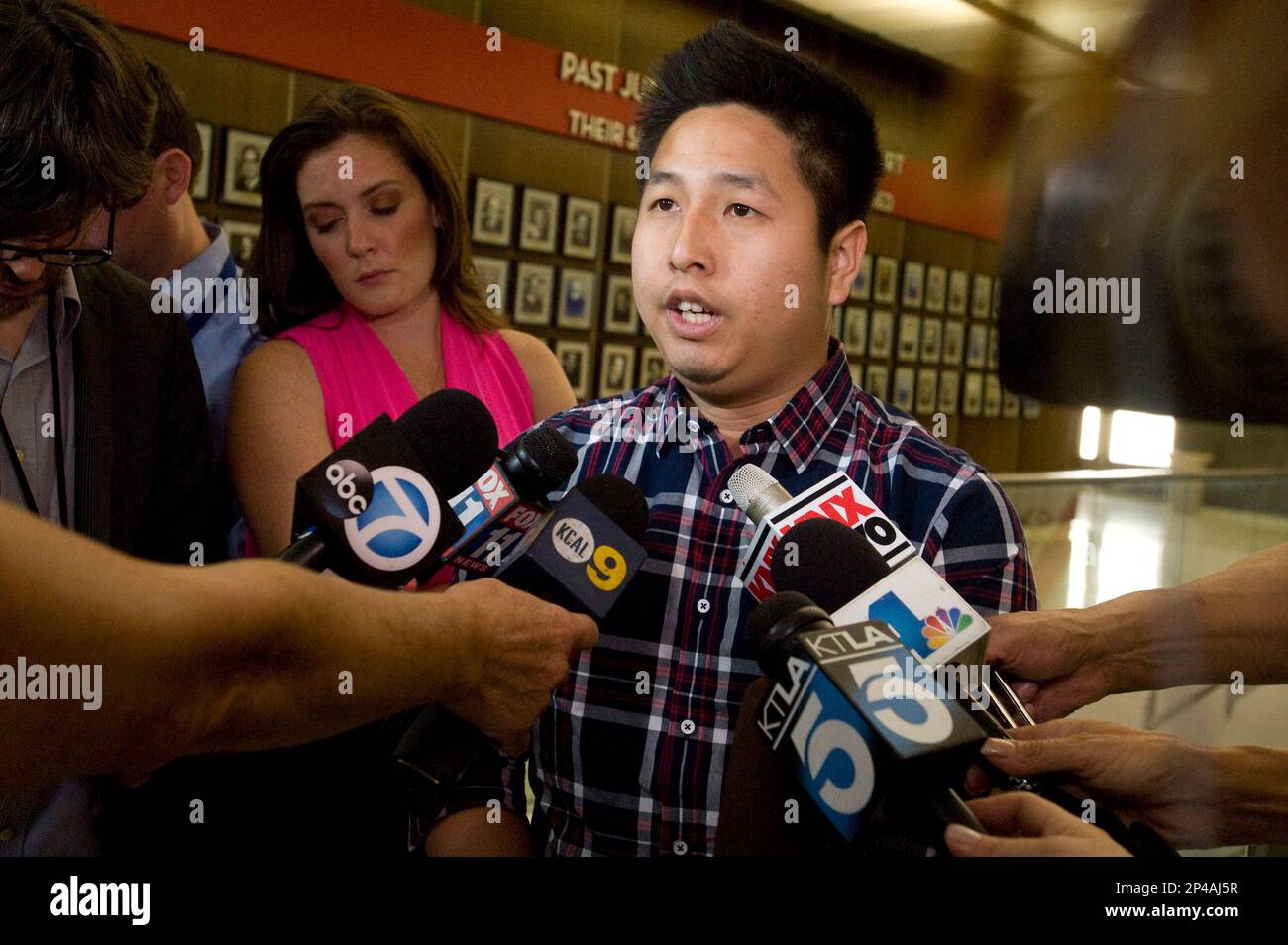 Ken Nguyen, Annie Kim Pham's step-brother, speaks to the media after ...