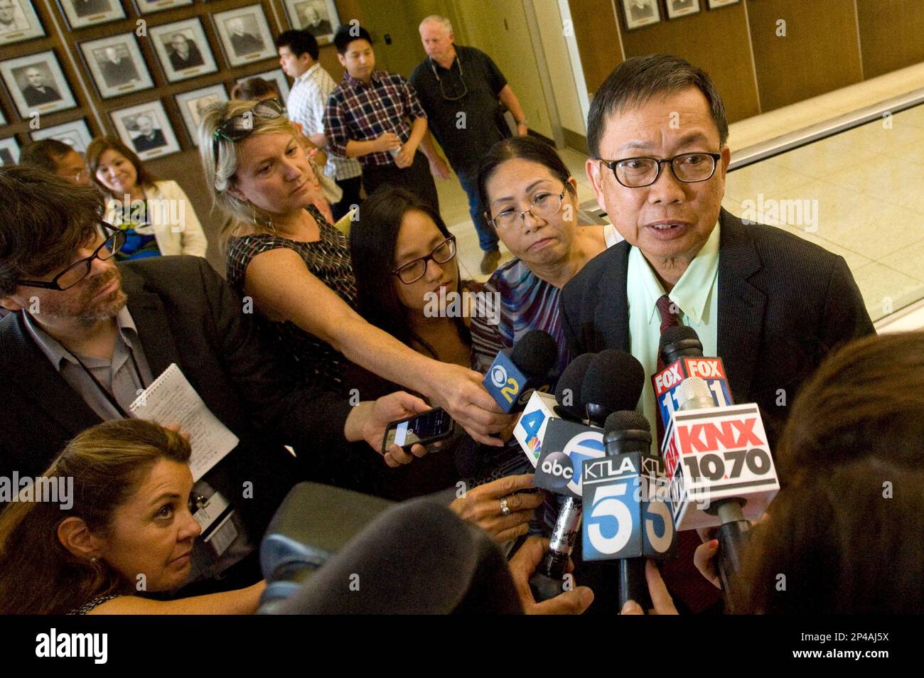 James Pham, father of Annie Kim Pham, speaks to the media after Candace ...