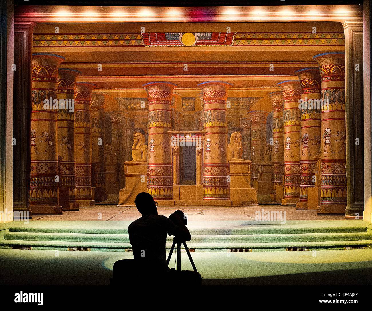 Peter Boysen of Winona, Minn., takes photos of drop sets for the City ...