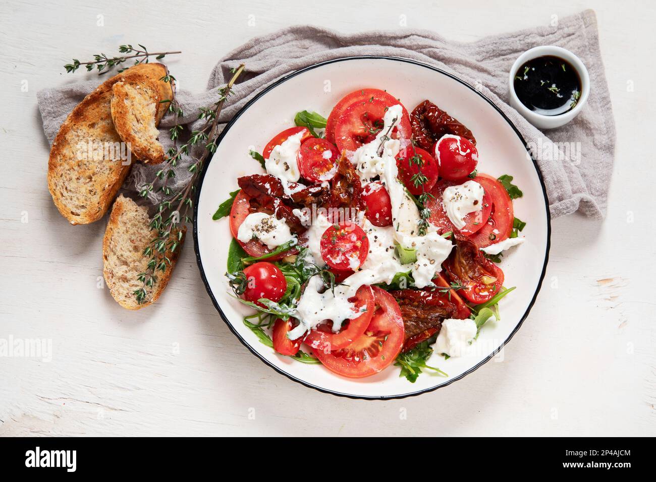 Tomato, basil, mozzarella. Caprese salad with olive oil. Top view ...