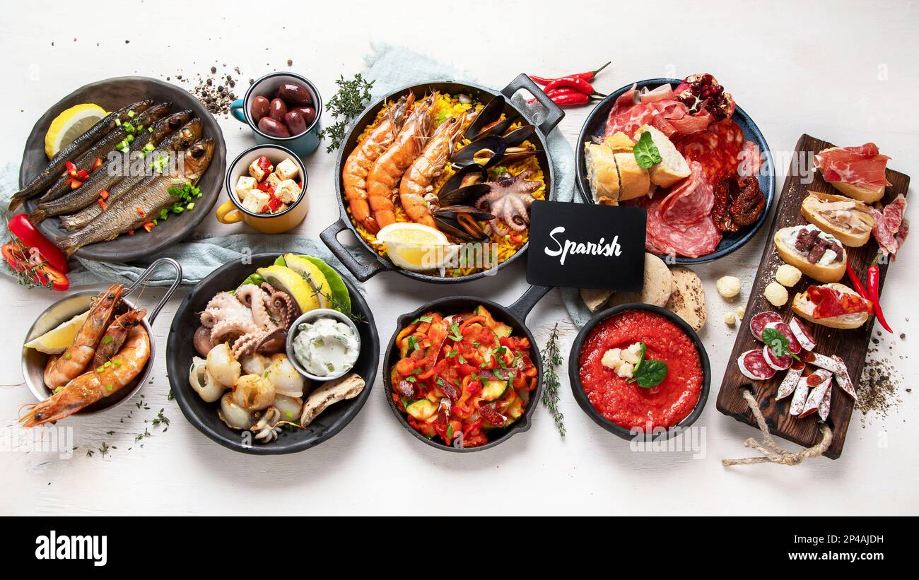 Typical spanish tapas concept. Concept include jamon, chorizo sausage ...