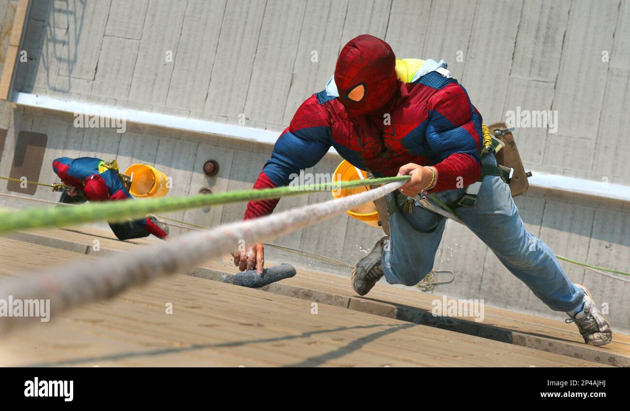 In this photo taken on Tuesday, July 22, 2014, Matt McGehee, right, and ...